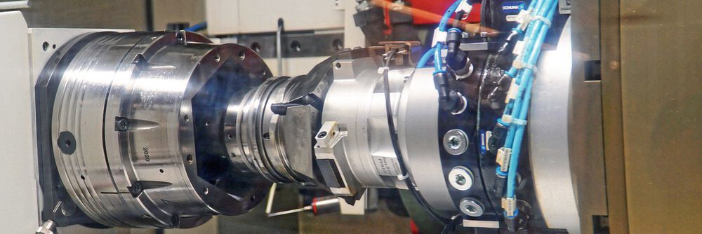 Wenn der Roboter die Spannmittel automatisch wechselt